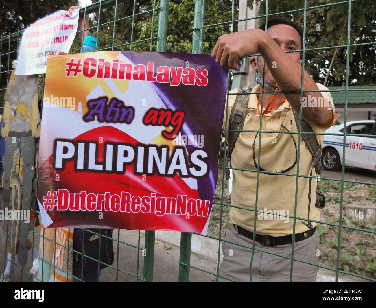 Quezon City, Philippines. 22nd Feb, 2020. A protester holds a placard ...
