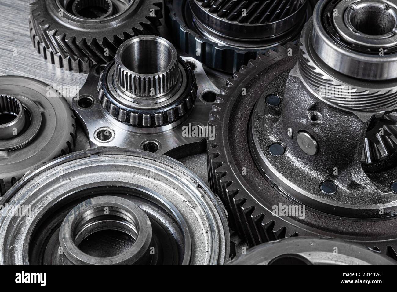 Set of various engine and gearbox spare parts. Shiny gears for ...