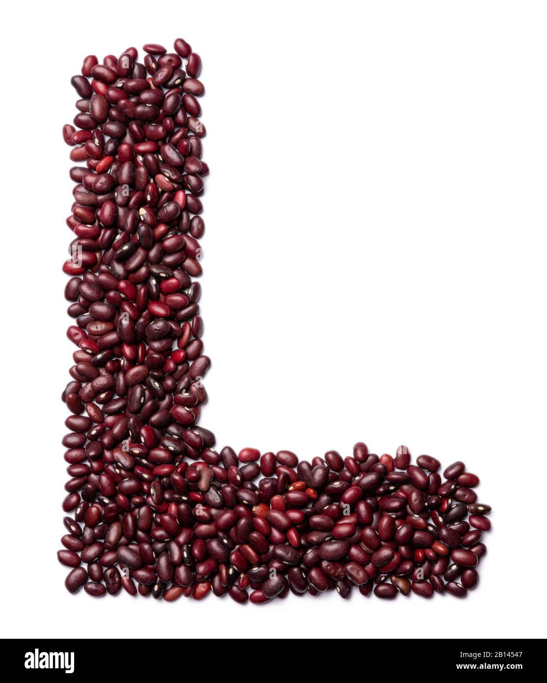 The letter "L" of the English alphabet from brown beans on a white ...