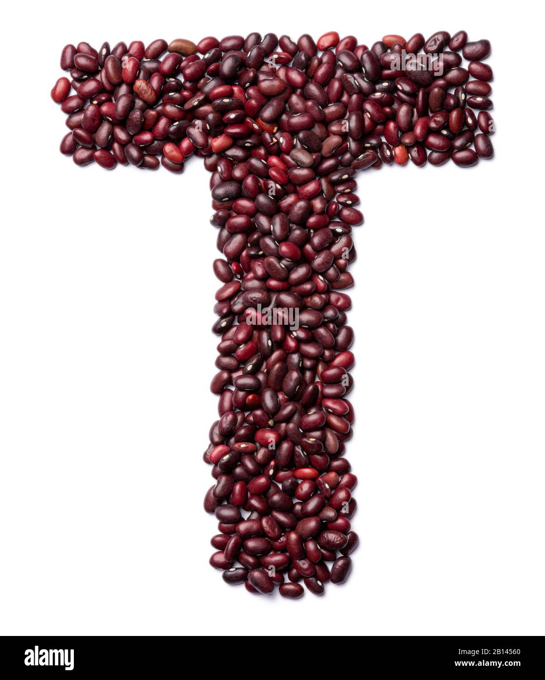 The letter "T" of the English alphabet from brown beans on a white ...