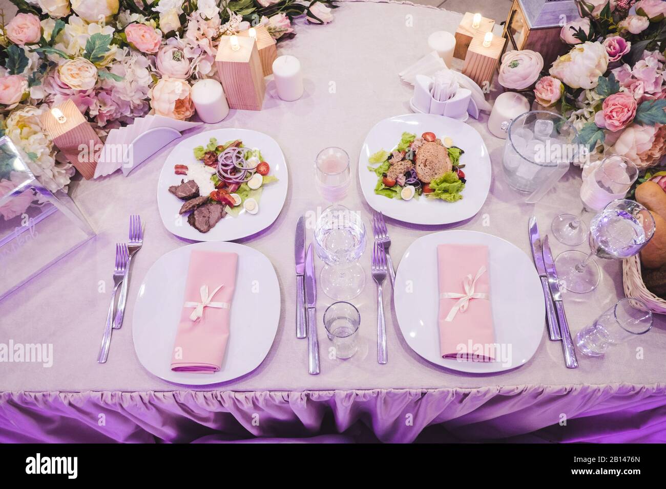 Colorful bright Wedding table setting. Top view Stock Photo - Alamy