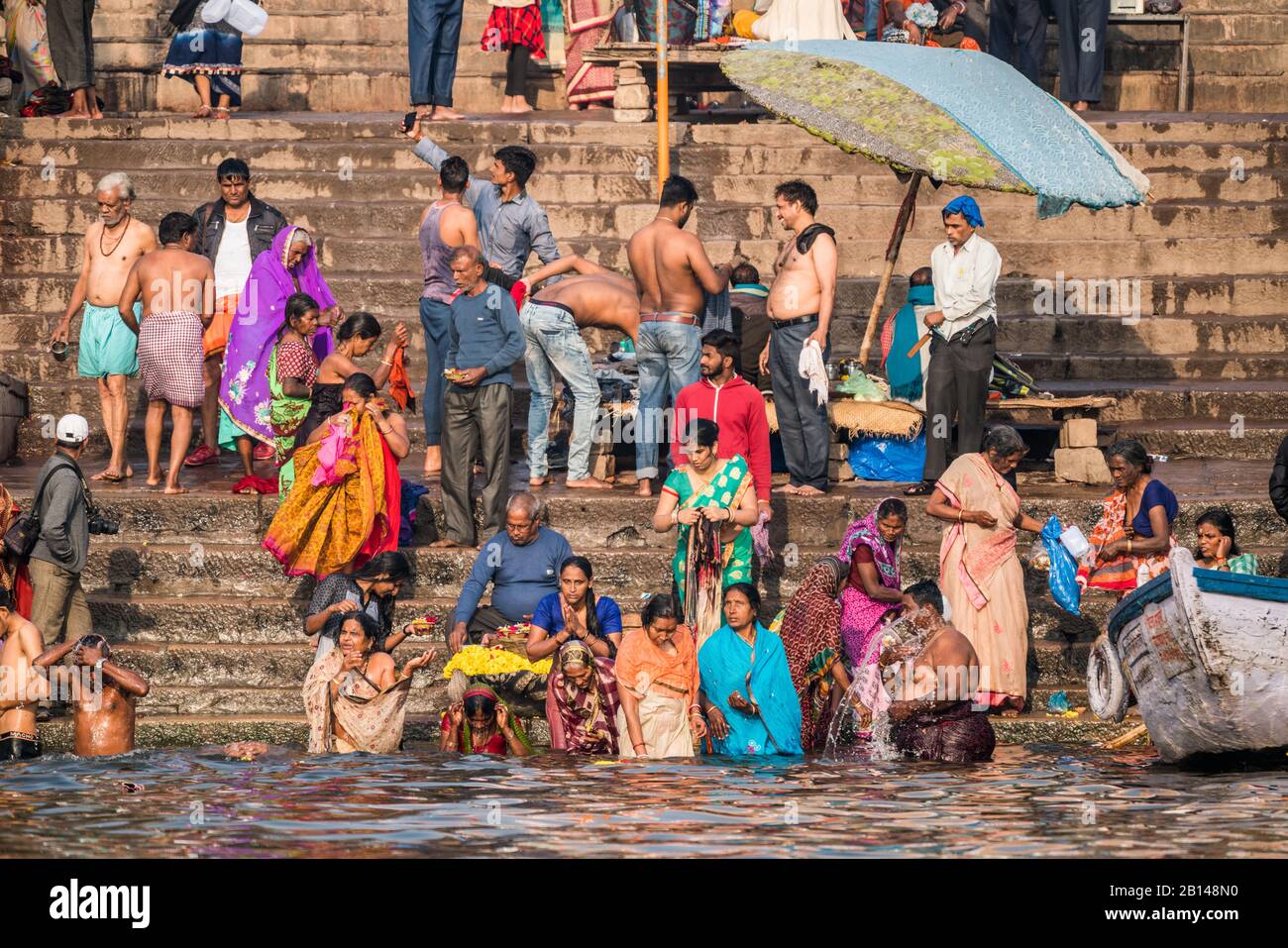Pilgrims have bath in the Ganga river, Varanasi, India, Asia Stock ...