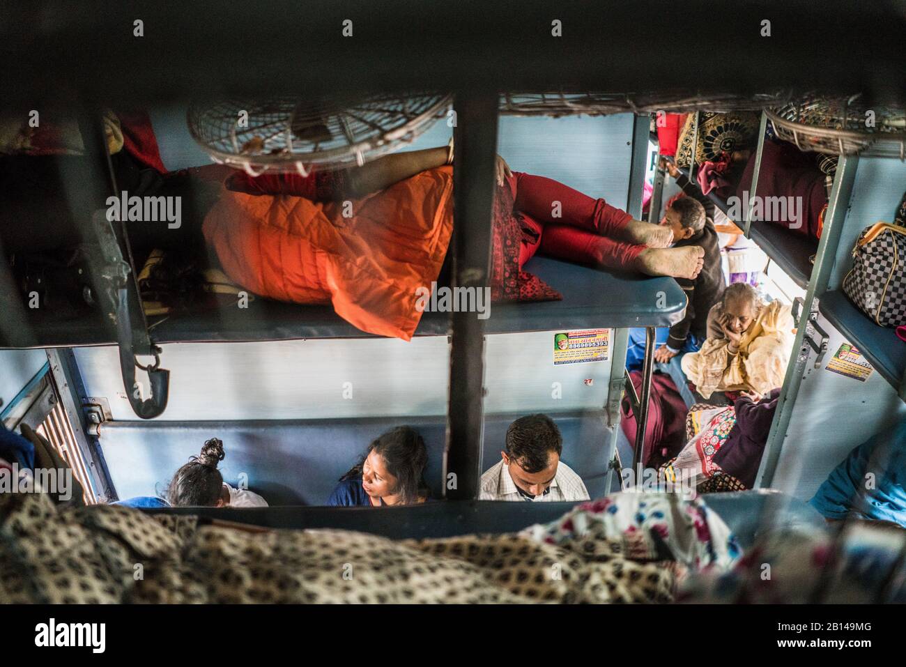 India train people sitting hi-res stock photography and images - Alamy
