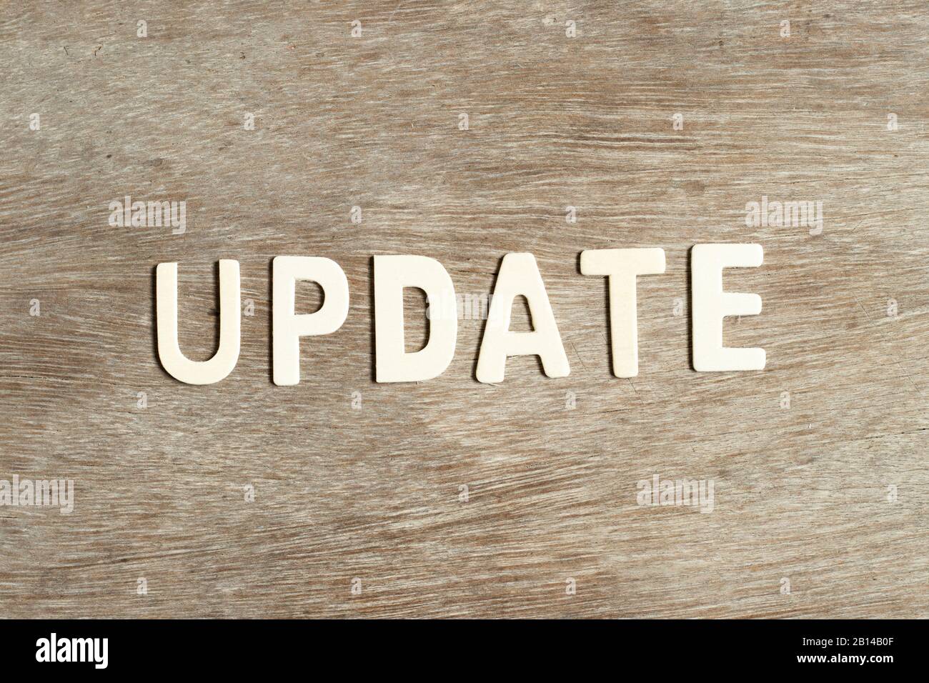Alphabet letter in word update on wood background Stock Photo - Alamy