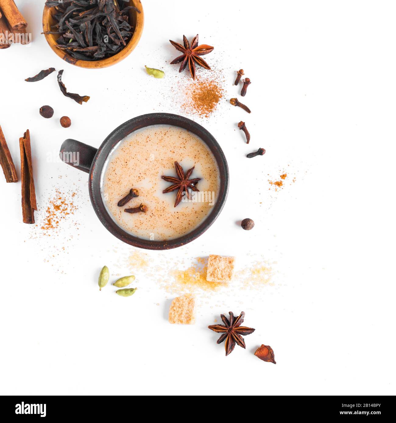 Masala Chai Tea in ceramic cup with ingredients. Traditional indian ...