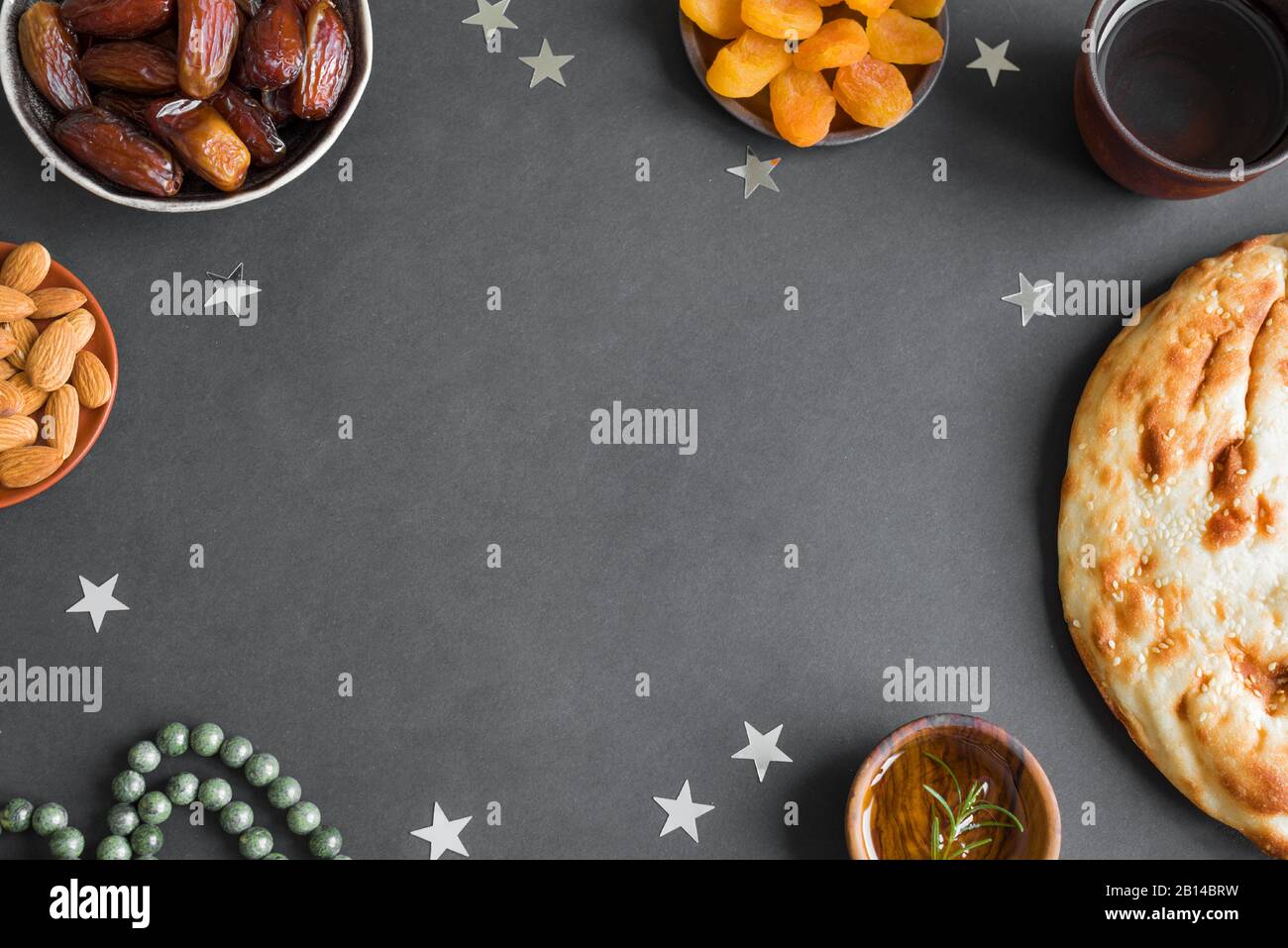 Ramadan iftar food - date fruits, ramadan fresh bread, olive oil, water ...