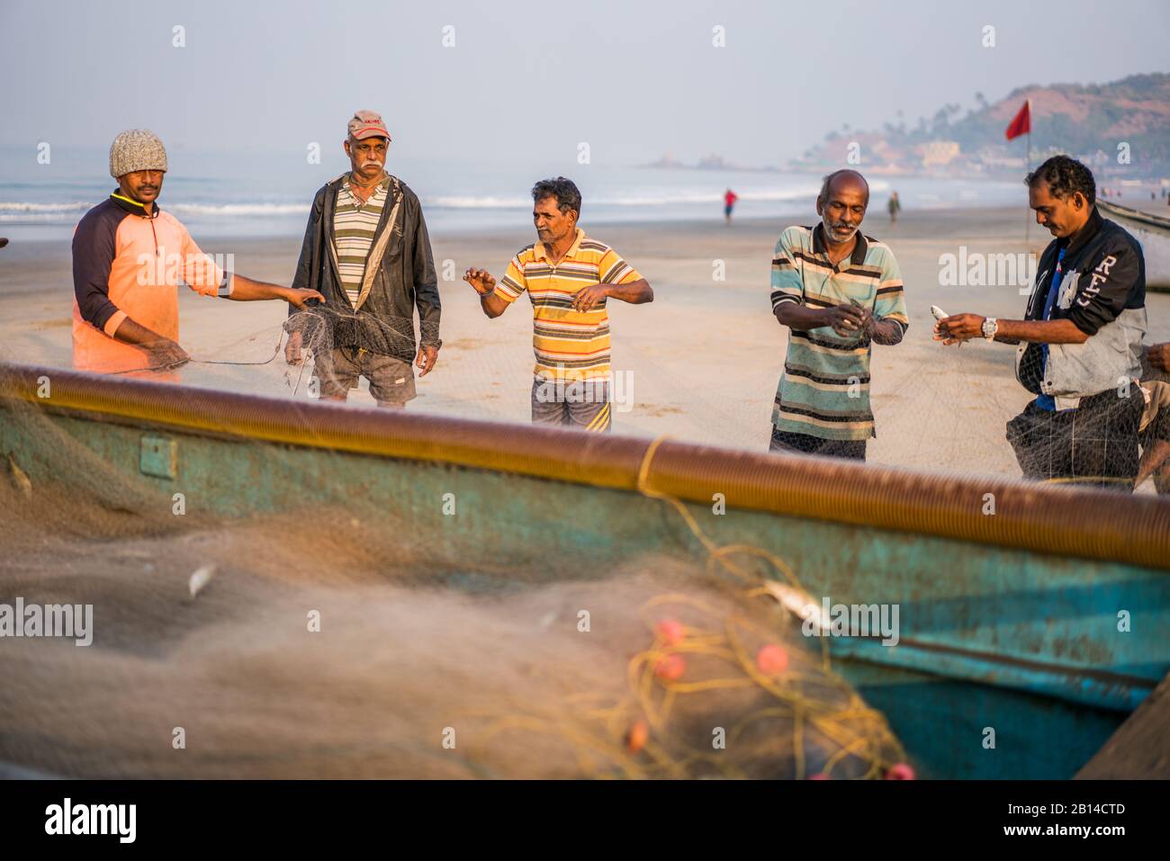 Fishermen on the Arambol beach, Goa, India, Asia Stock Photo - Alamy