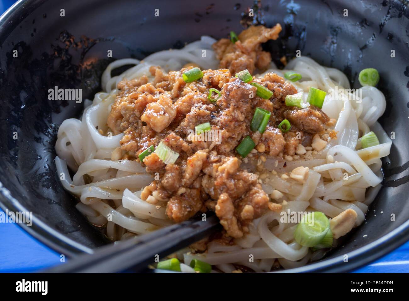 Burmese noodle and meat sauce breakfast Stock Photo - Alamy