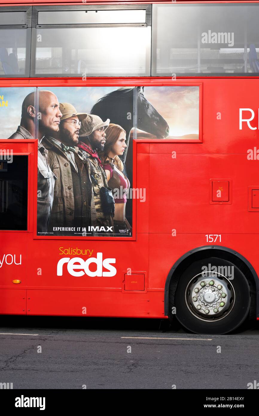 motion picture advertisement on side of bus Stock Photo - Alamy