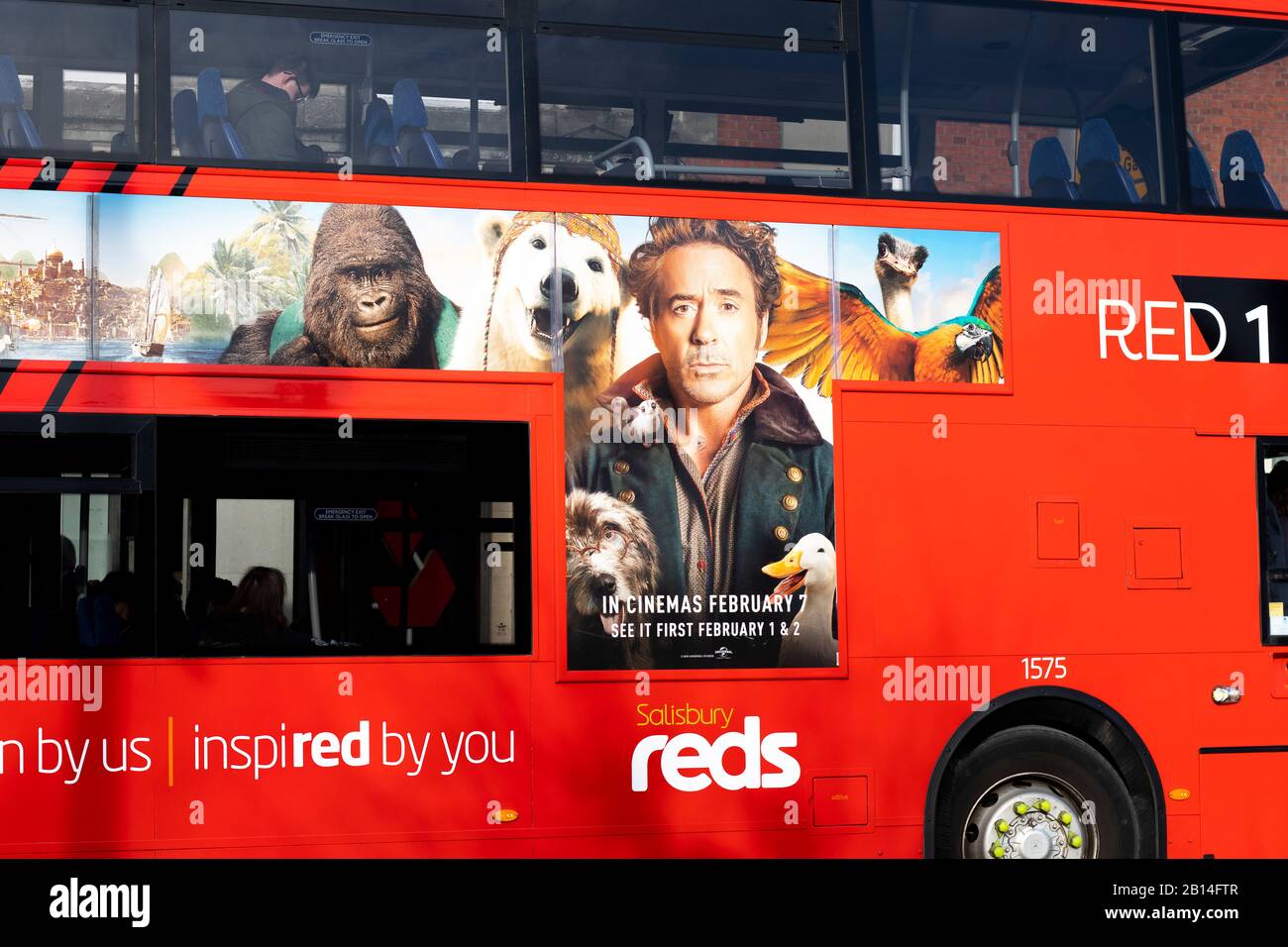 motion picture advertisement on side of bus Stock Photo - Alamy