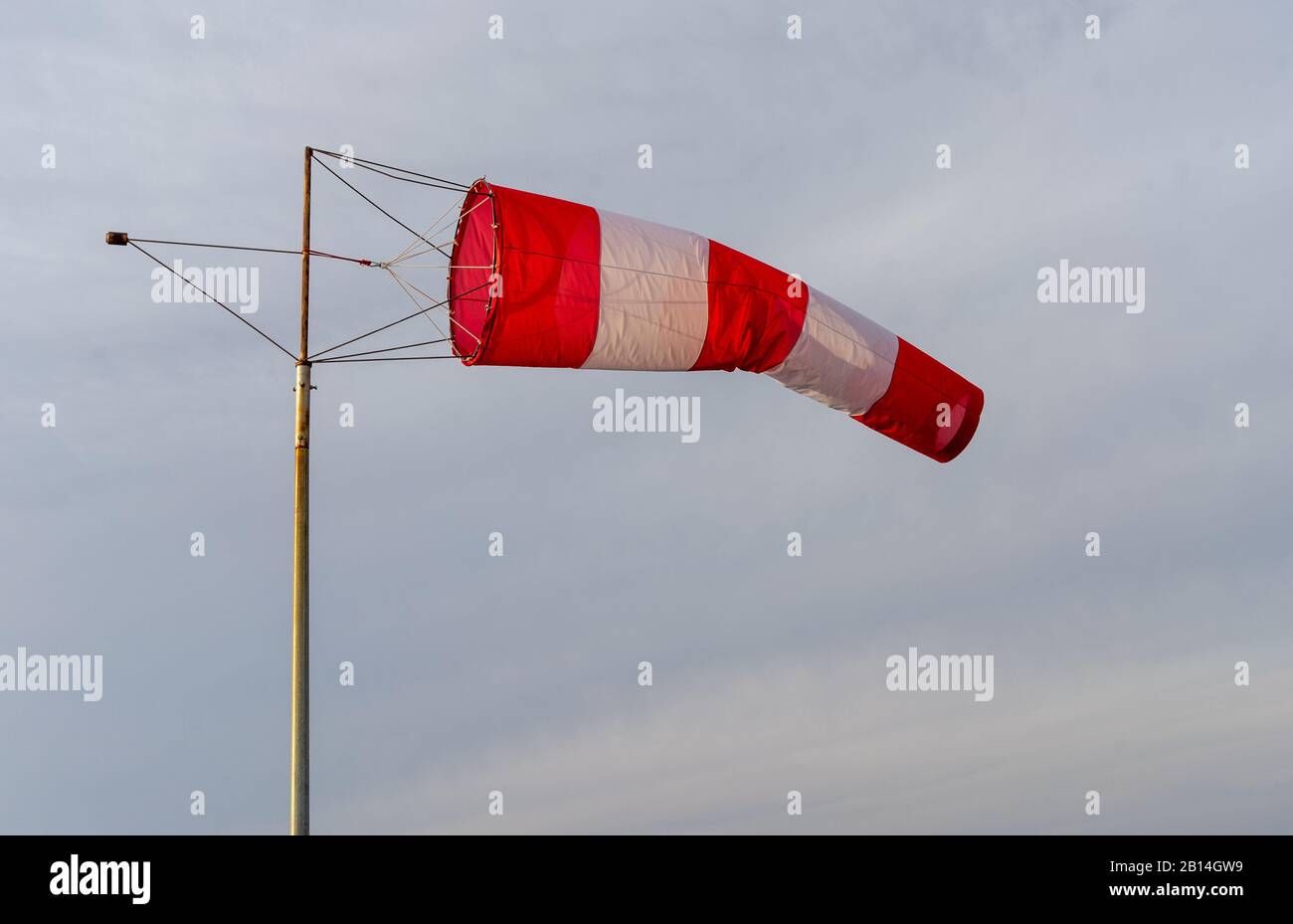 red-and-white wind designator designed to indicate the direction and ...