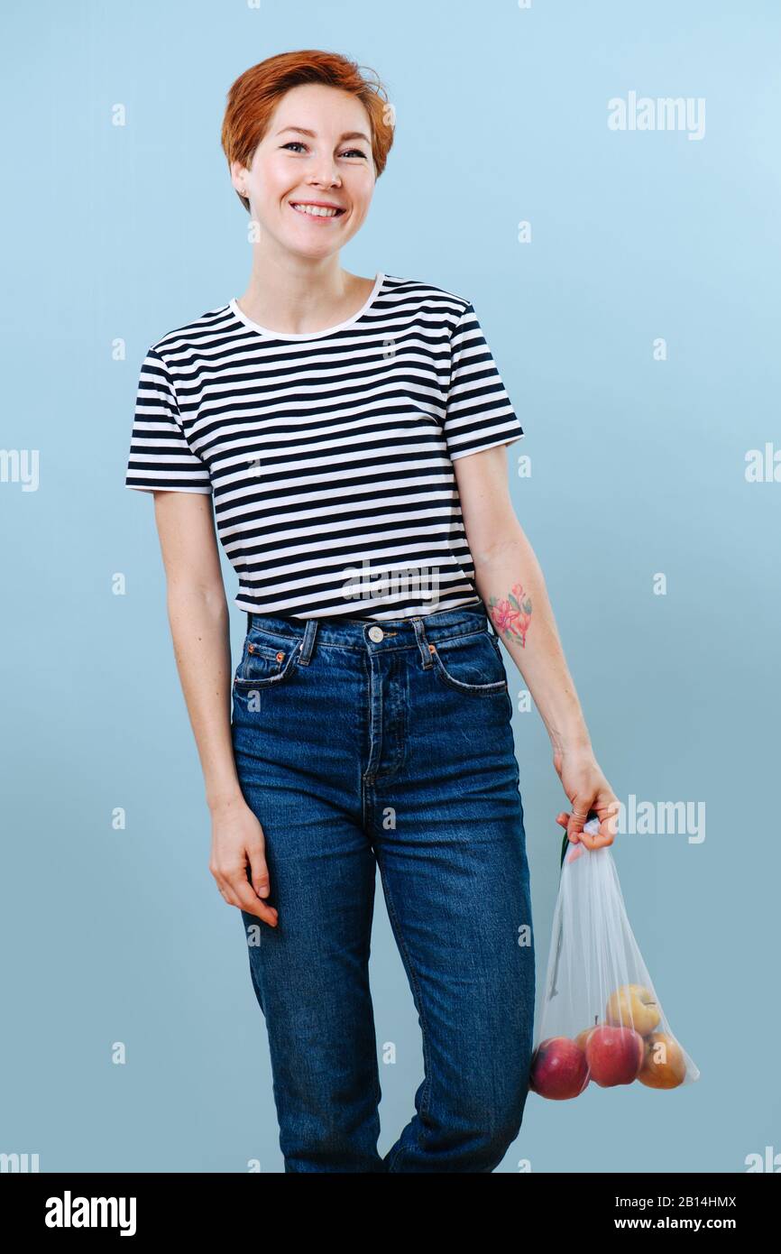 Girl holding a bag net hi-res stock photography and images - Alamy