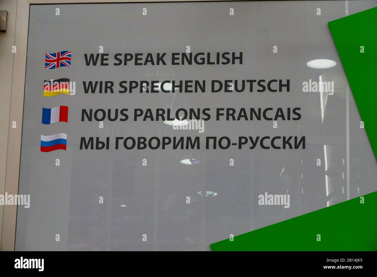 We speak english here sign hi-res stock photography and images - Alamy