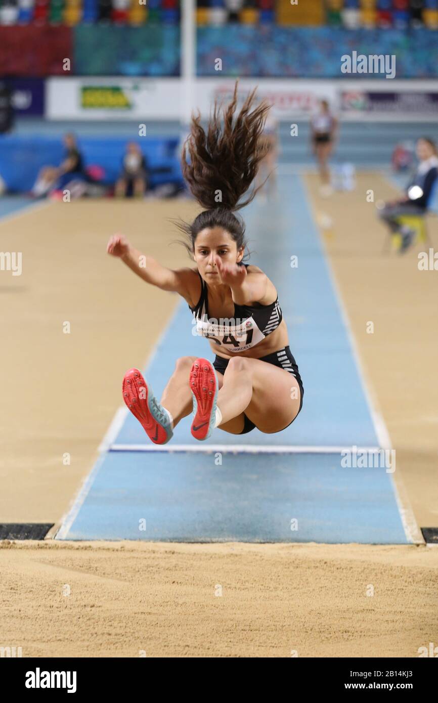 ISTANBUL, TURKEY - FEBRUARY 02, 2020: Undefined athlete long jumping ...
