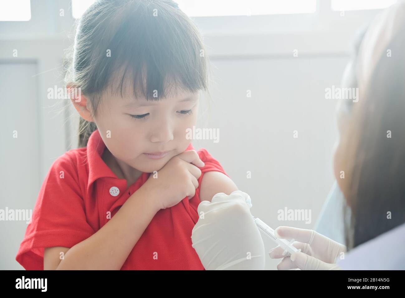 Asian Little child having Injection,Close-up Doctor injecting ...