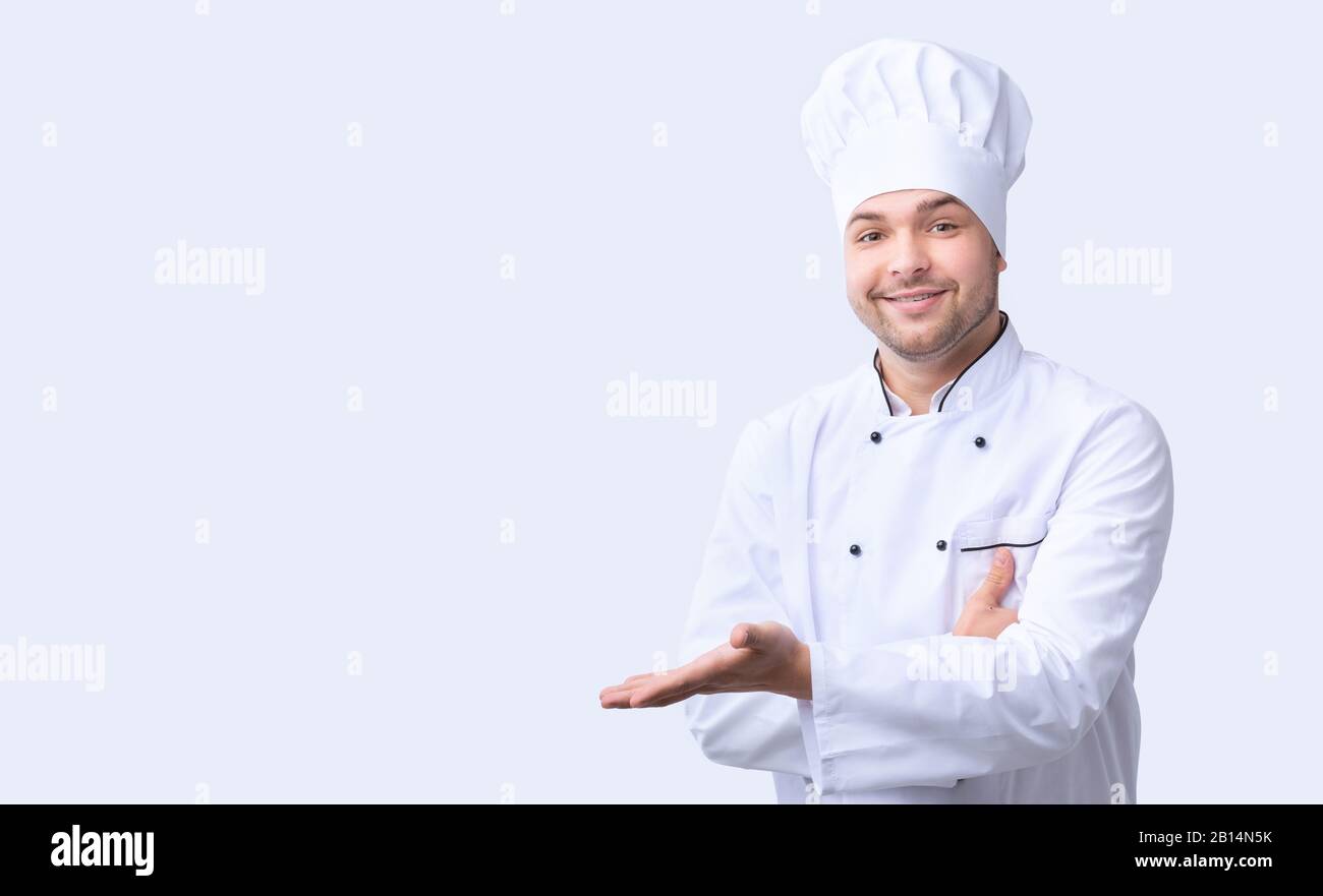 Chef Gesturing With Hand Pointing At Free Space, White Background Stock ...