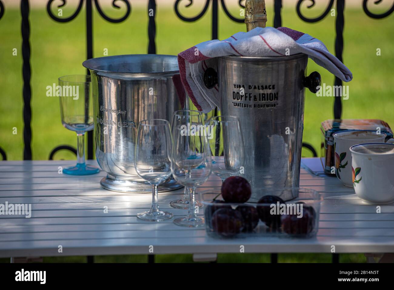 Flea market on a long crowded street, a lot of people selling their ...