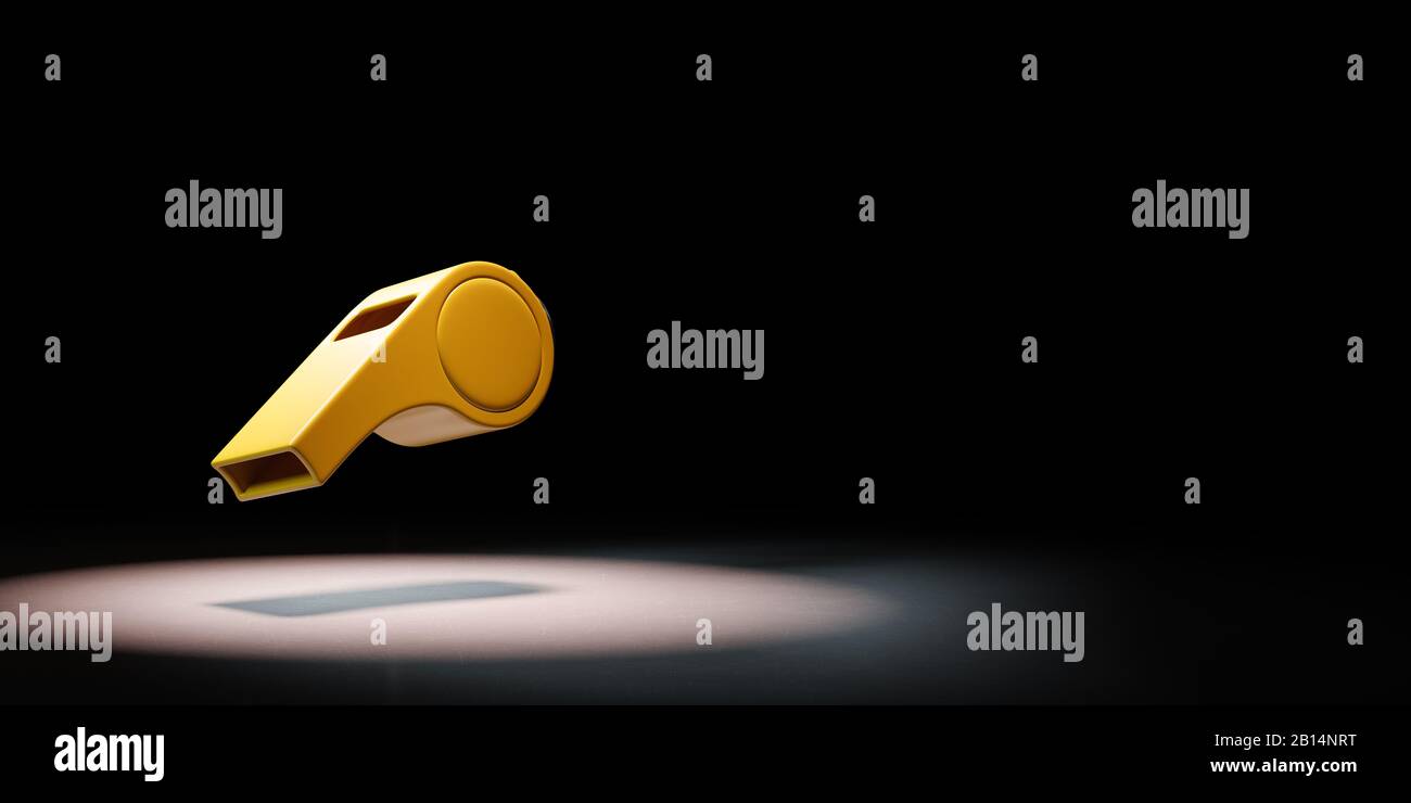 One Yellow Plastic Whistle Spotlighted on Black Background Stock Photo ...