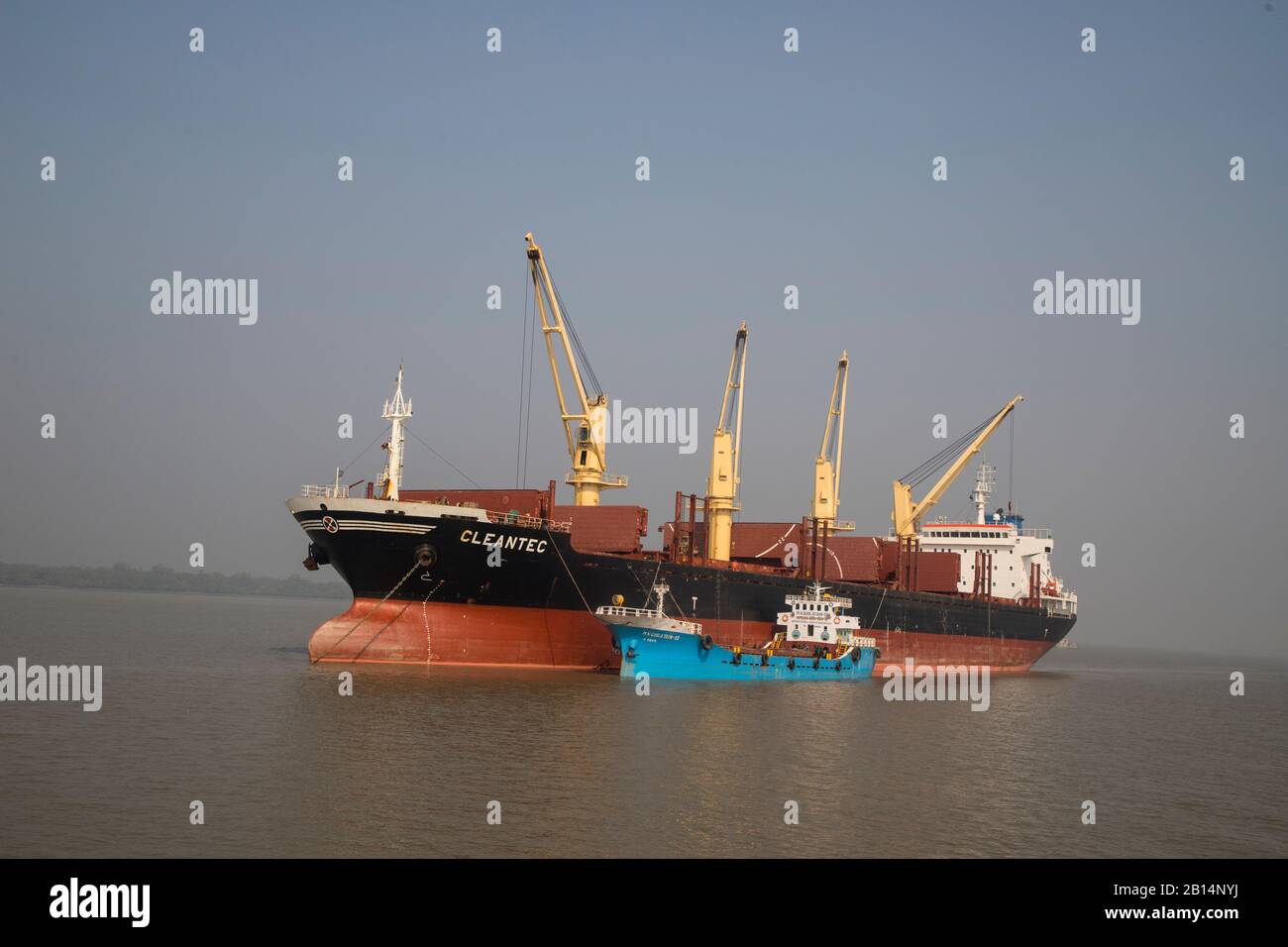 Foreign cargo vessel anchored on the Poshur River near the Mongla Sea ...