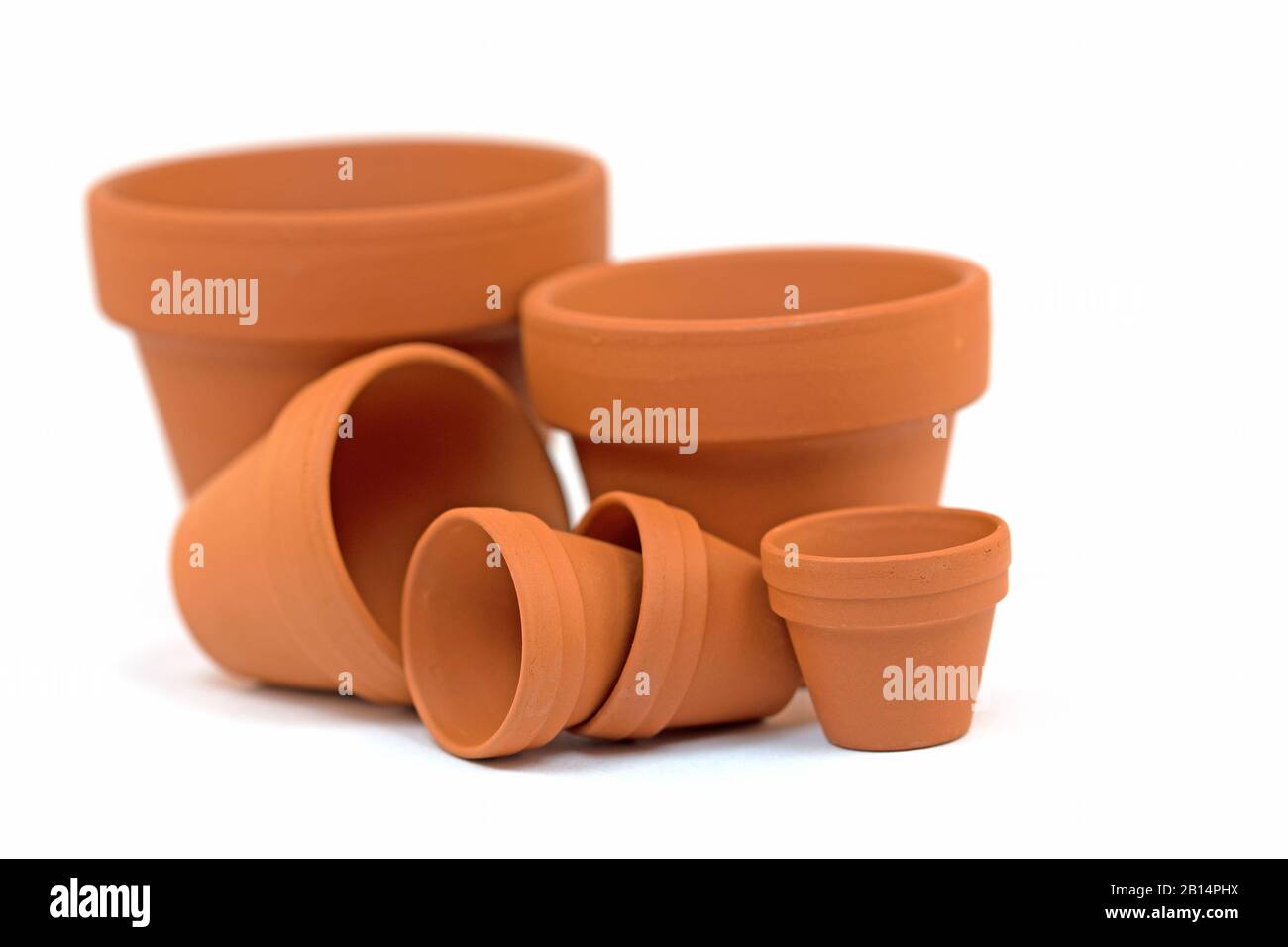 Empty flower pots against white background Stock Photo - Alamy