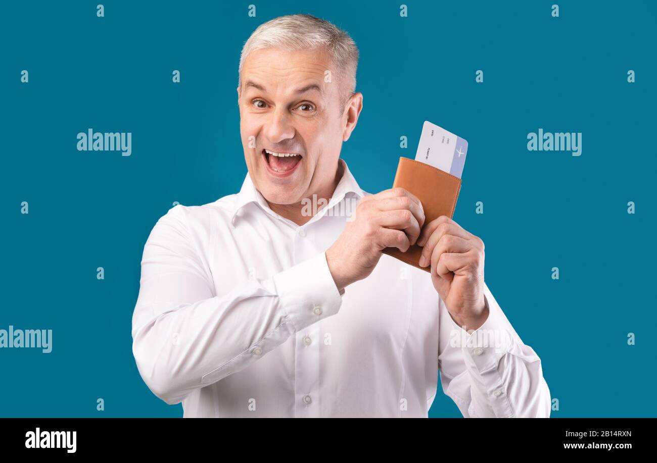 Man holding tickets hi-res stock photography and images - Alamy