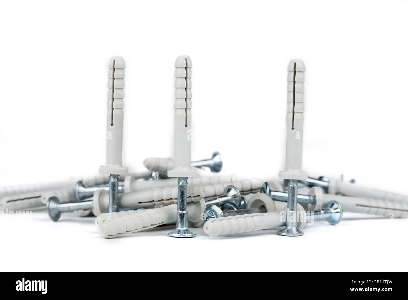 Screw with a plug for construction and repair on a white Stock Photo ...