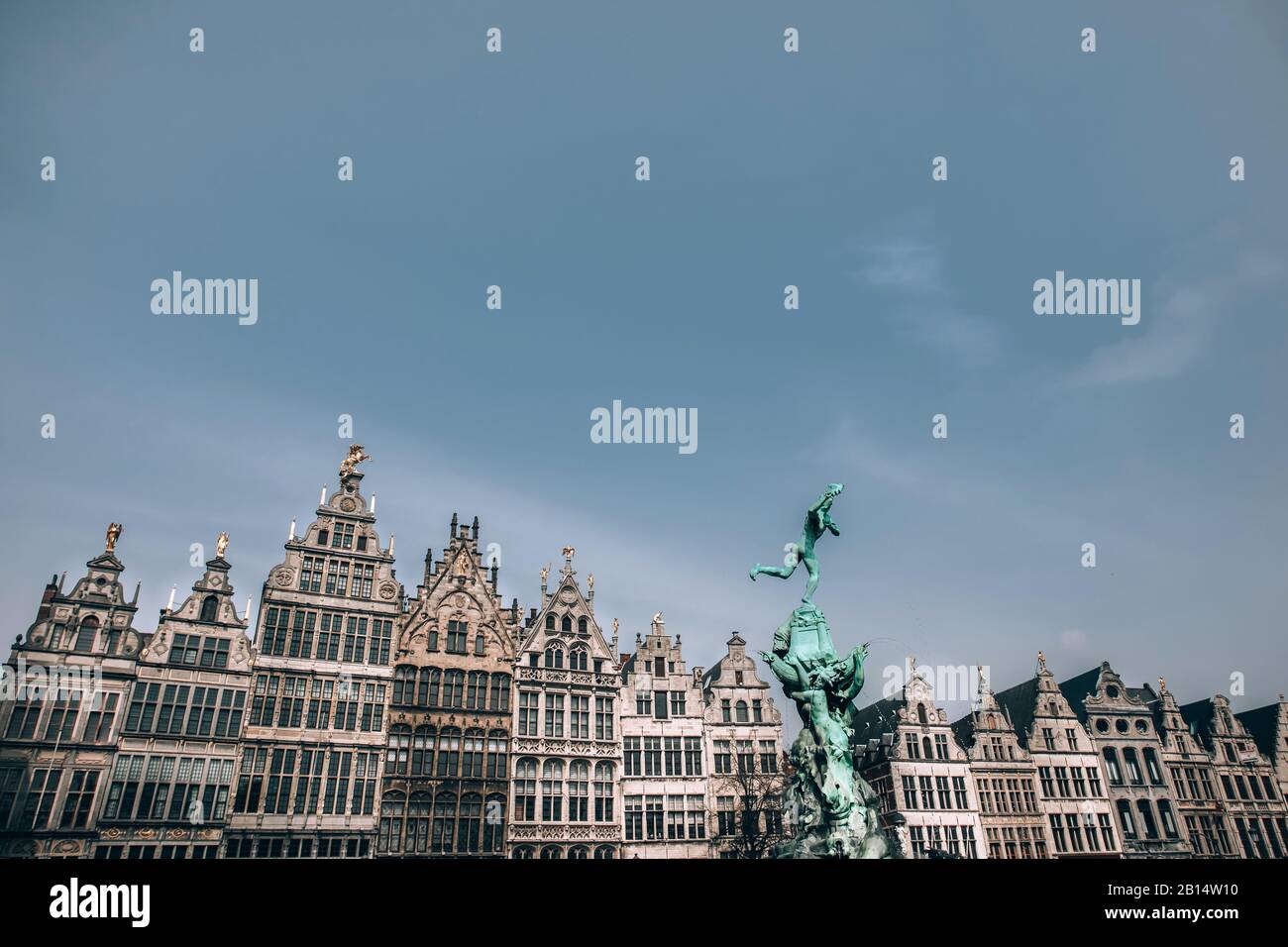 Famous Antwerp historic building, and Brabo fountain sculpture Stock ...
