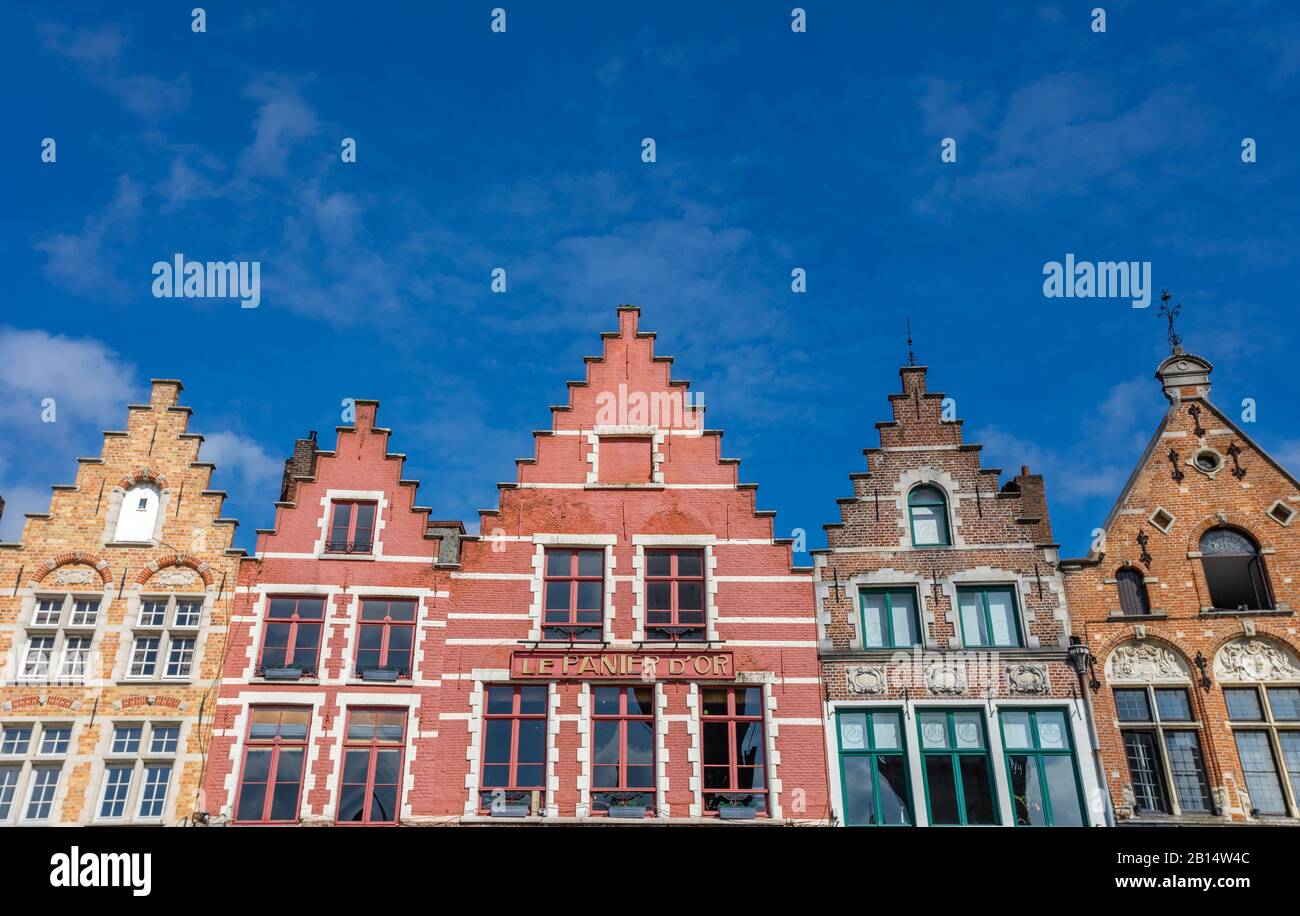 Row of colorful building in Bruges. Historic buildings, Belgian ...