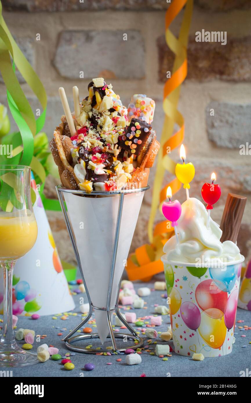 Bubble Waffle with sweets and ice cream Stock Photo - Alamy
