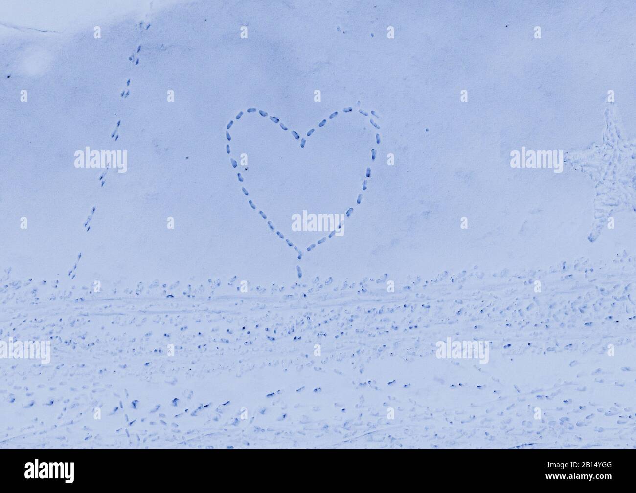 Love heart in the snow Stock Photo - Alamy