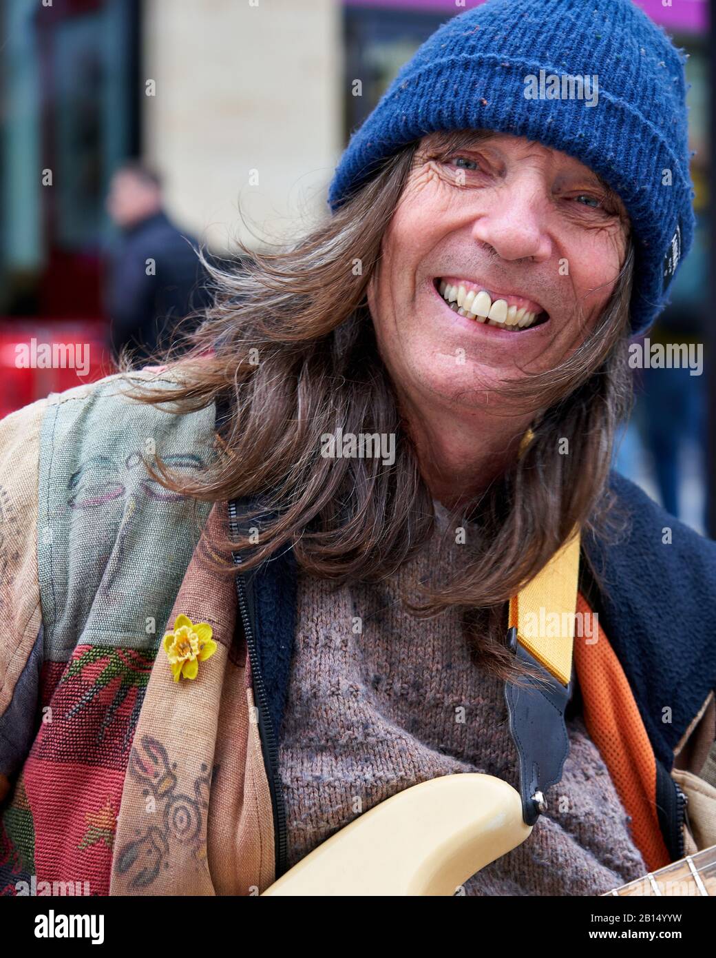 Guitarist Mark Allen busking on Queen Street, Cardiff, South Wales ...