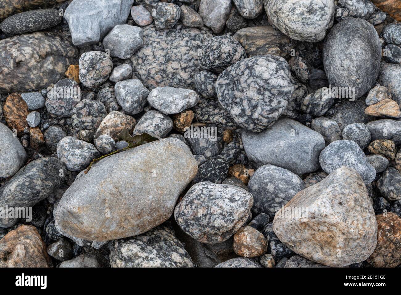 Granite rocks stones close-up texture background. Glacial rough natural ...