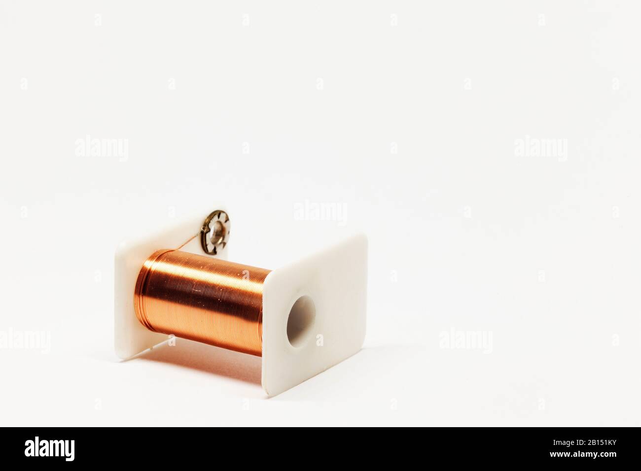 electromagnet coil on white background Stock Photo - Alamy