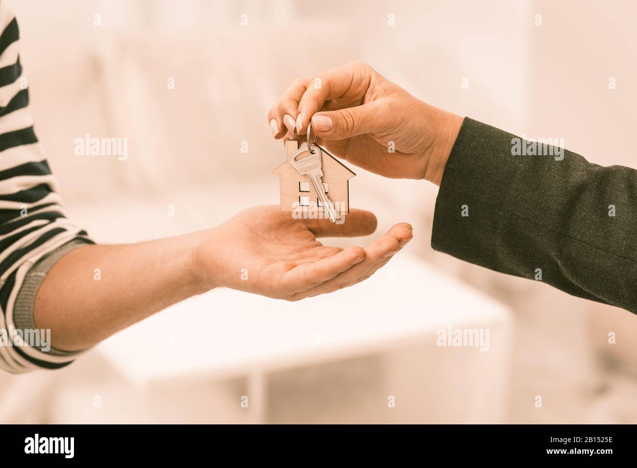 Keys from a new house given to owner Stock Photo - Alamy