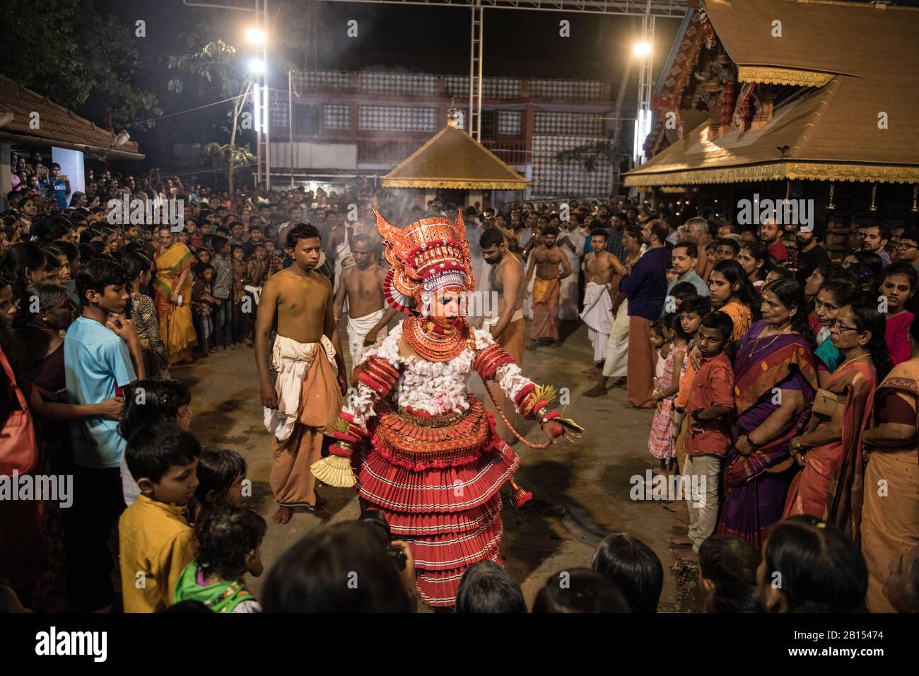 Theyyam performer, as a living god, dances a popular ritual form of ...