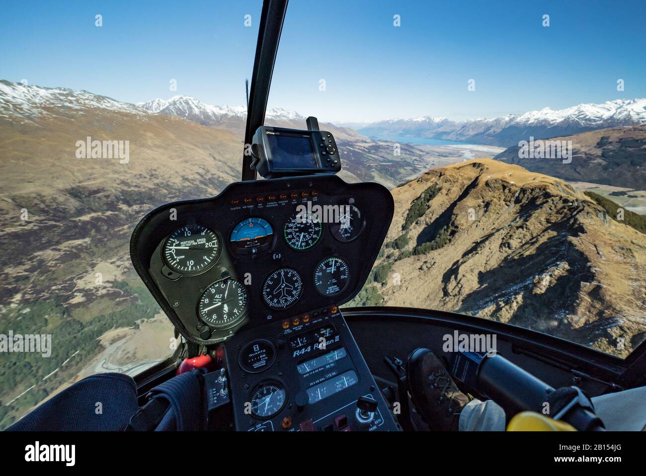Helicopter cockpit view the Dart River valley heading towards Lake ...