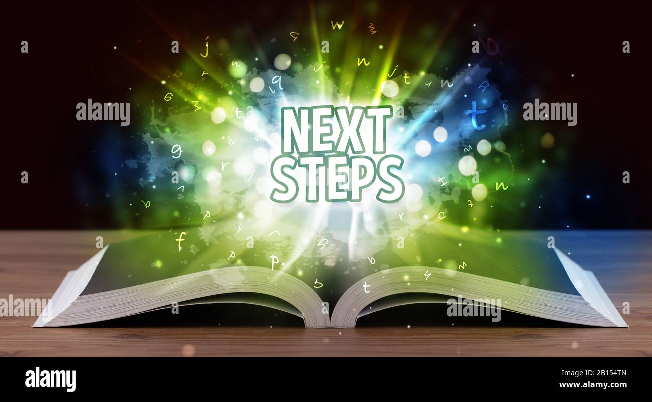 NEXT STEPS inscription coming out from an open book, educational ...