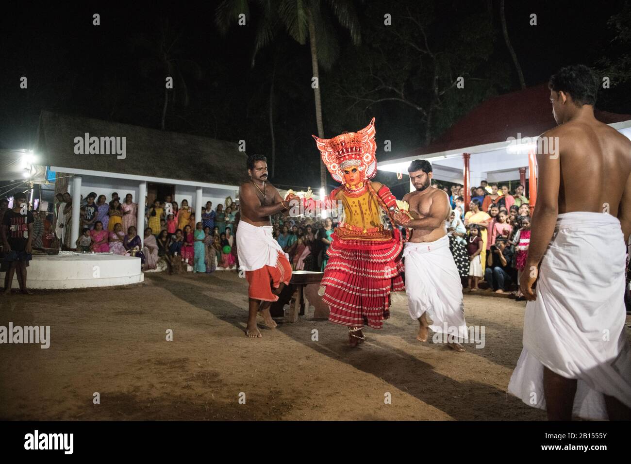 Theyyam performer, as a living god, dances a popular ritual form of ...