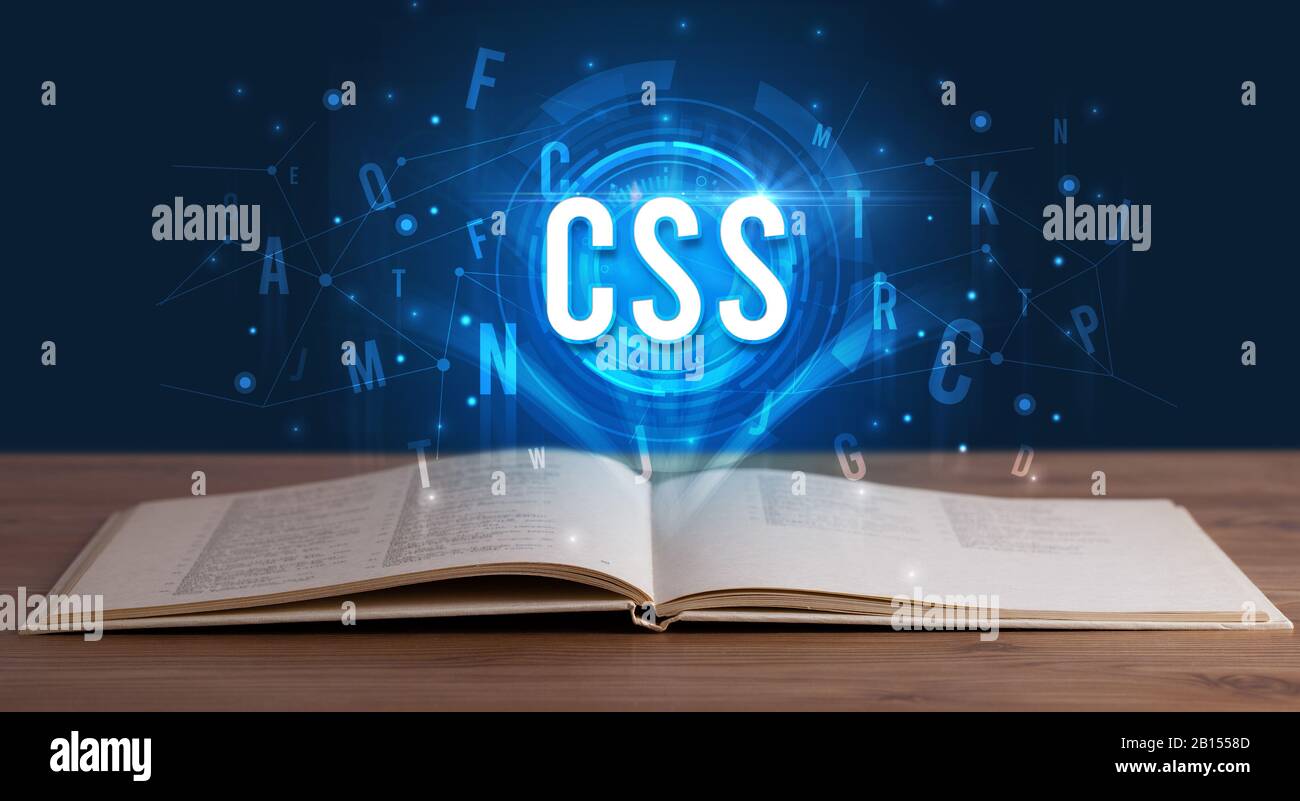 CSS inscription coming out from an open book, digital technology ...