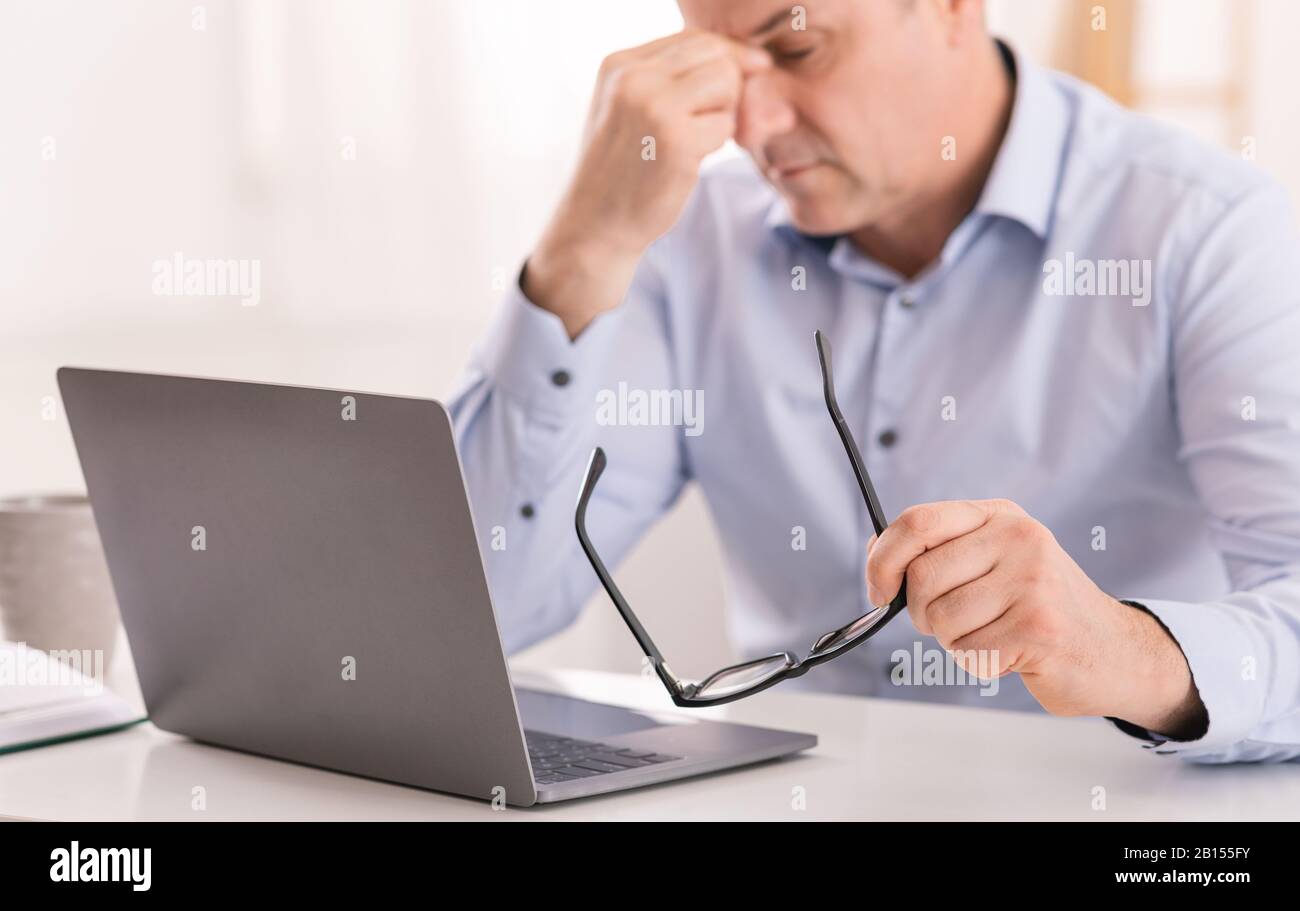 Elderly employee exhausted hi-res stock photography and images - Alamy