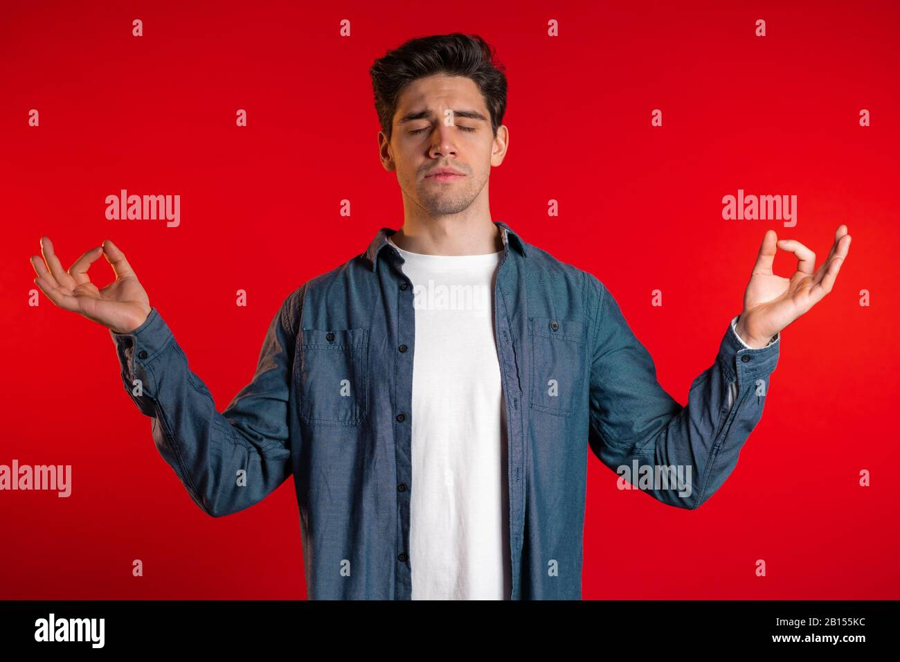 Calm student guy or businessman relaxing, meditating. Handsome european ...