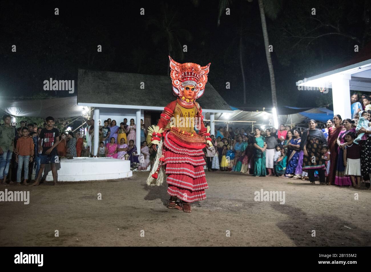 Theyyam performer, as a living god, dances a popular ritual form of ...