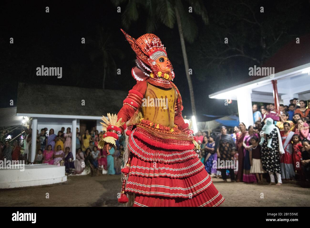 Theyyam performer, as a living god, dances a popular ritual form of ...