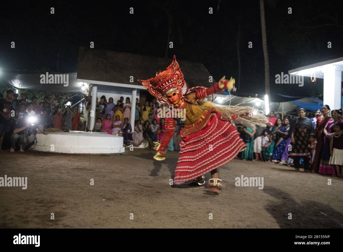 Theyyam performer, as a living god, dances a popular ritual form of ...