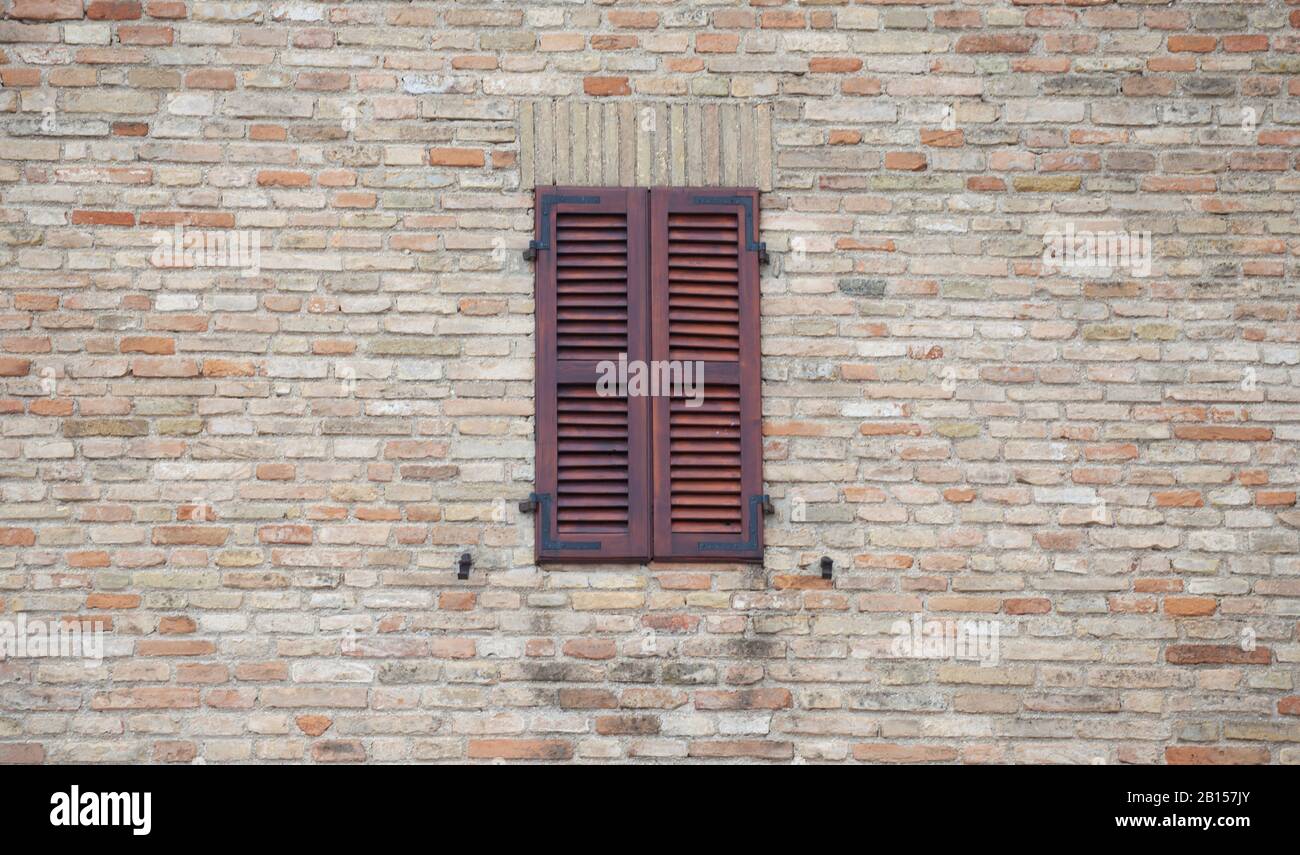 Window closed shutter on a brick wall Stock Photo - Alamy