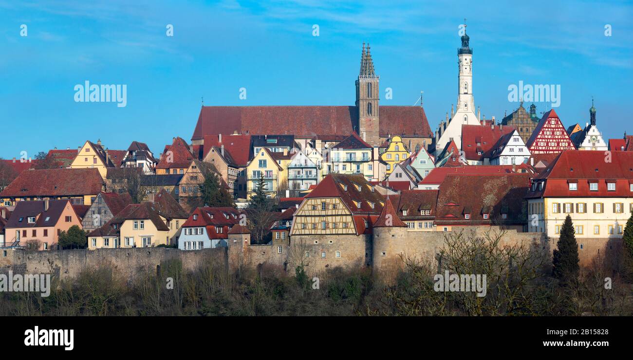 Aerial panoramic view of town wall, quaint colorful facades and roofs ...