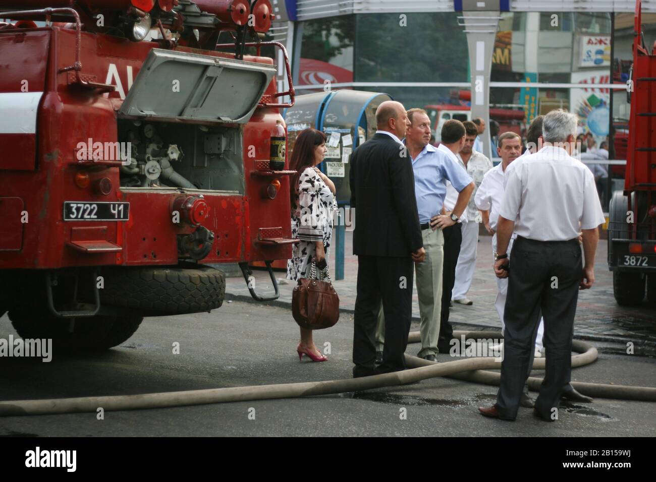 At the scene of a fire in a building. Firefighters Work Concept Stock ...