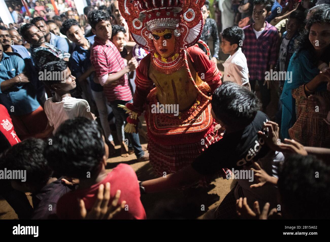Theyyam performer, as a living god, dances a popular ritual form of ...