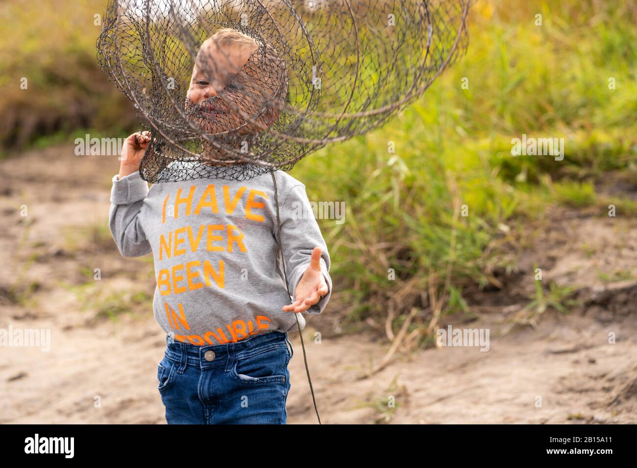 Boy with a net on his head hi-res stock photography and images - Alamy