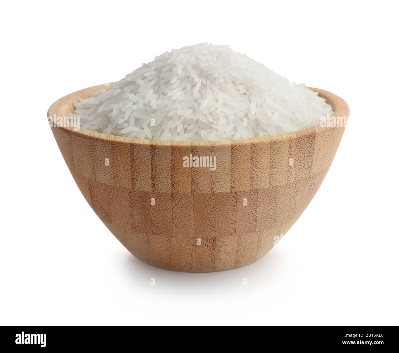 Rice in a wooden bowl isolated on white background Stock Photo - Alamy